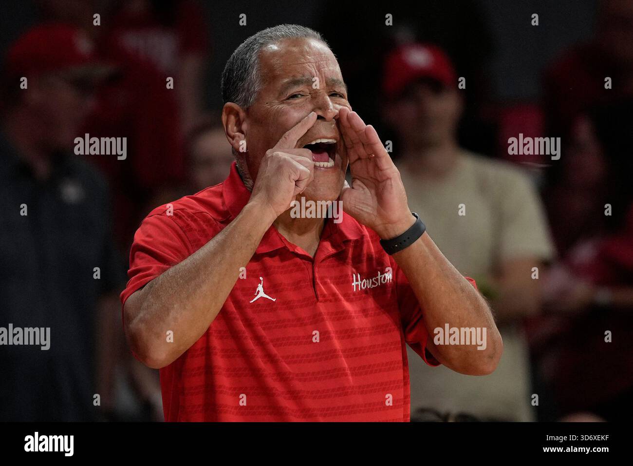 Houston head coach Kelvin Sampson calls to his team during the second ...