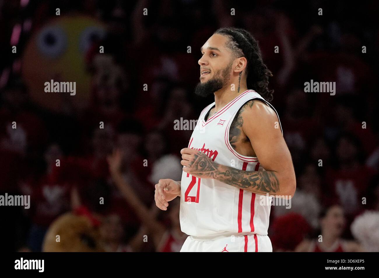 Houston guard Emanuel Sharp (21) smiles after hitting a three-pointer ...