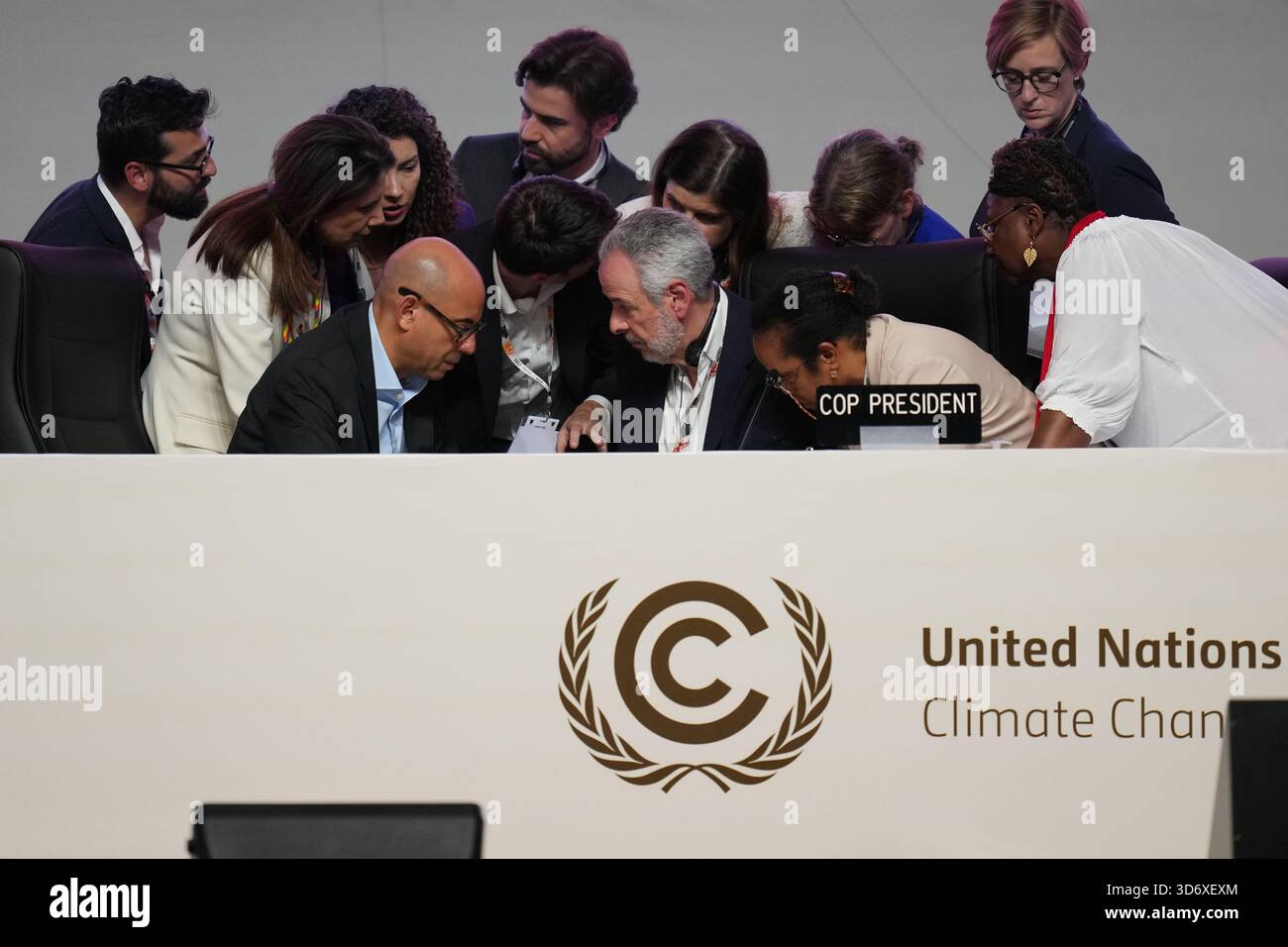 André Corrêa do Lago, COP30 president, center, and Simon Stiell, United ...