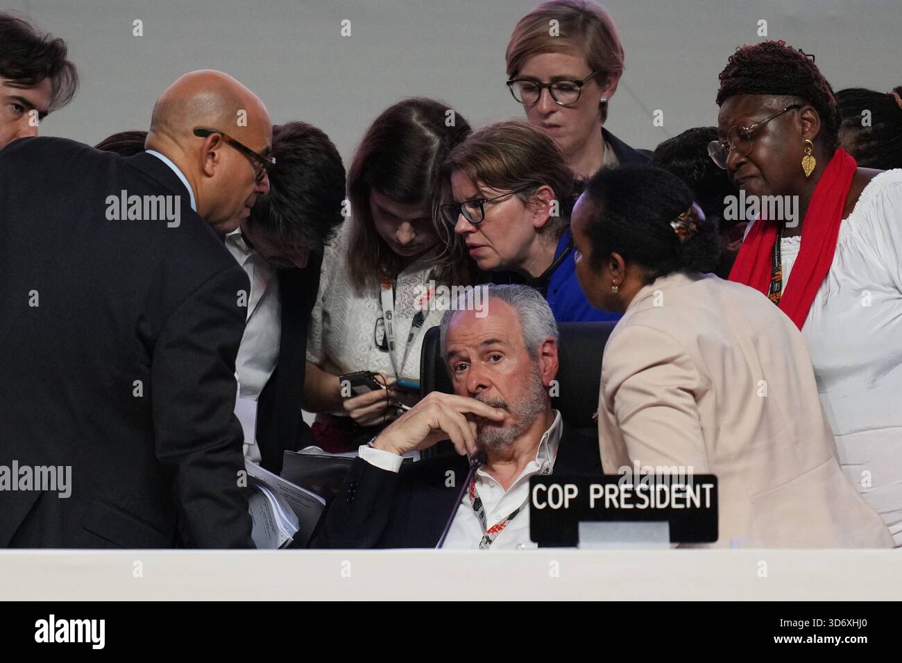 André Corrêa do Lago, COP30 president, sits as Simon Stiell, United ...