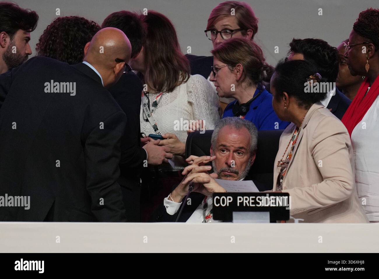 André Corrêa do Lago, COP30 president, sits as Simon Stiell, United ...