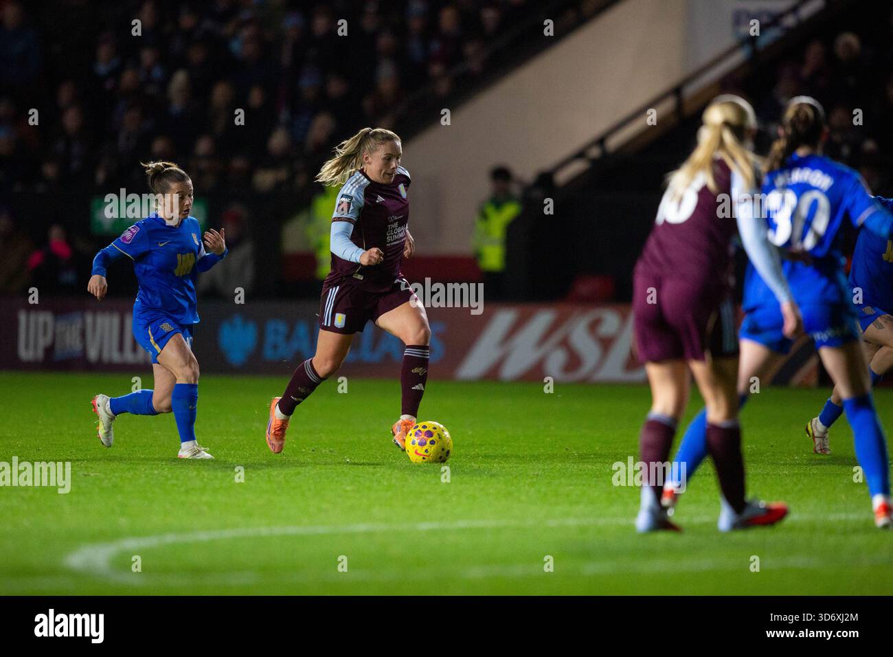 Kirtsy Hanson (20 Aston Villa) drives towards the edge of the box ...