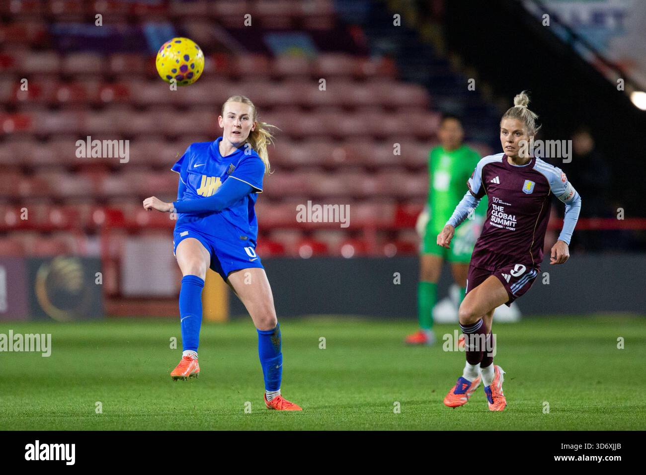 Shannon Cooke (6 Birmingham City) passes the ball wide under pressure ...