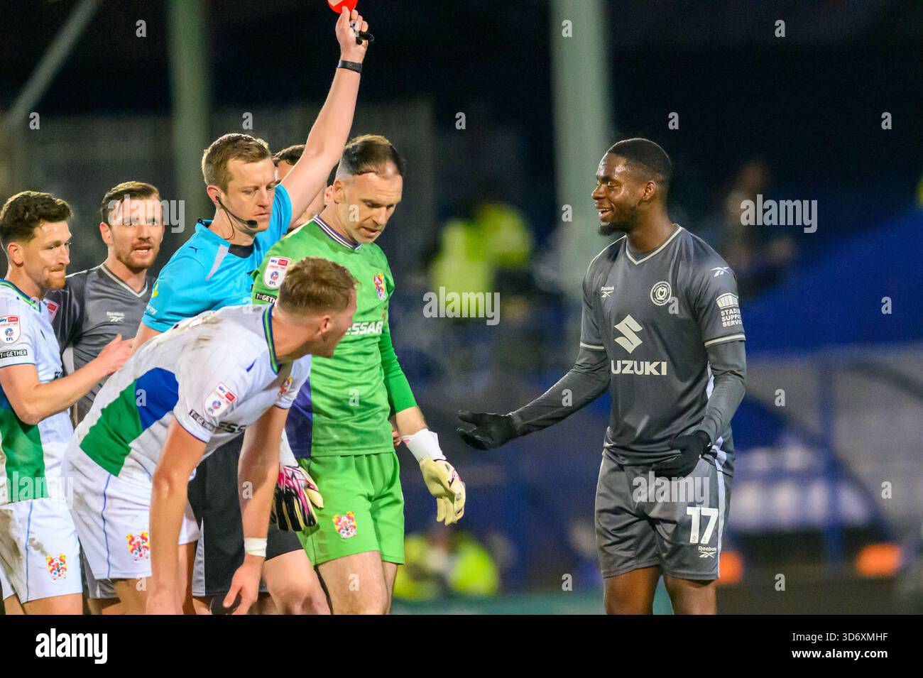 Jonathan Leko of Milton Keynes Dons receives a red card from Referee ...