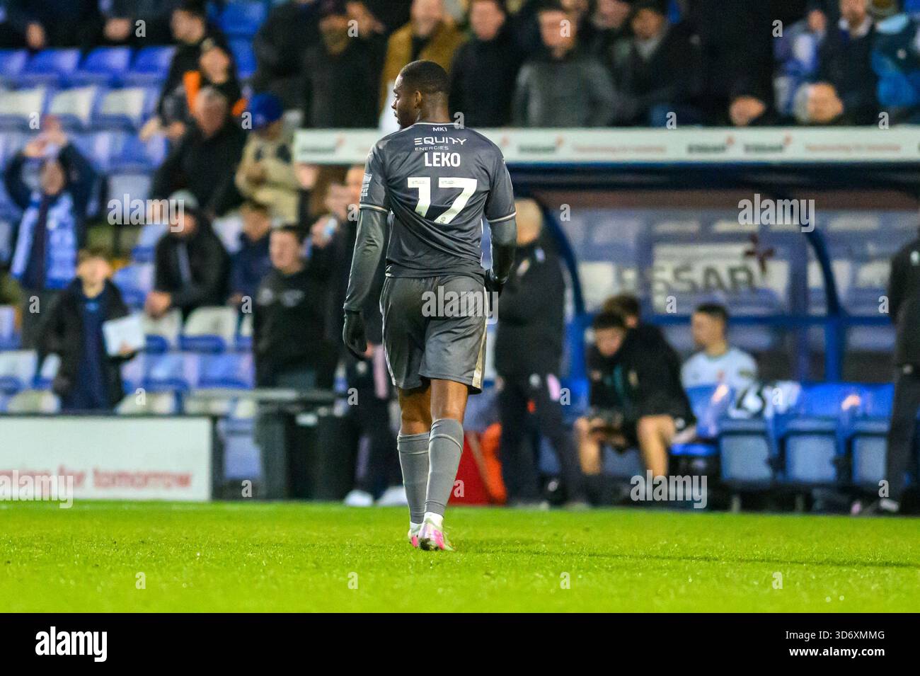 Jonathan Leko of Milton Keynes Dons leaves the pitch after his red card ...
