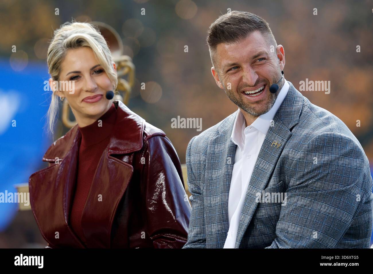 NASHVILLE, TN - NOVEMBER 22: Laura Rutledge and Tim Tebow smile on set ...