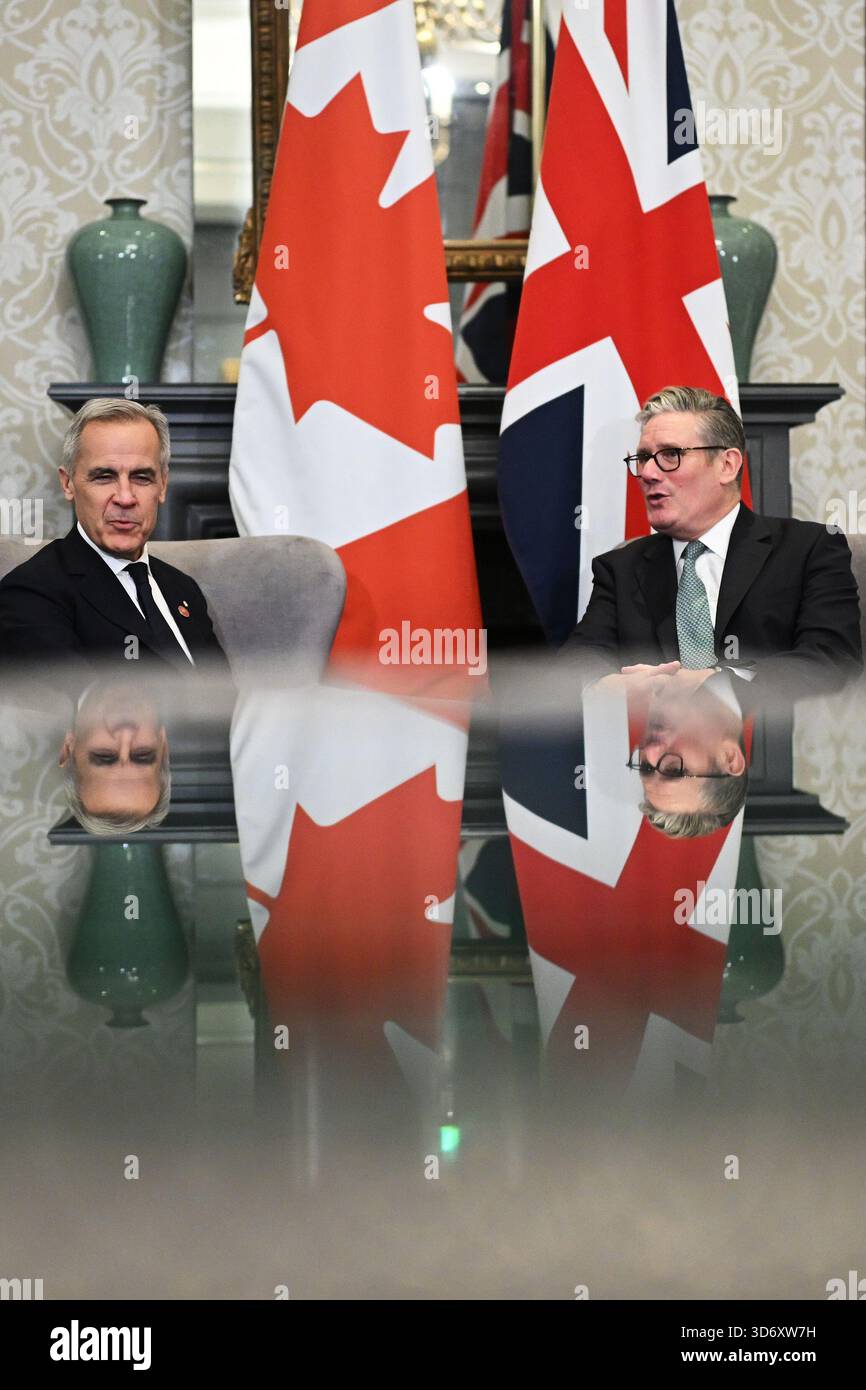 Prime Minister Sir Keir Starmer (right) and Canadian Prime Minister ...