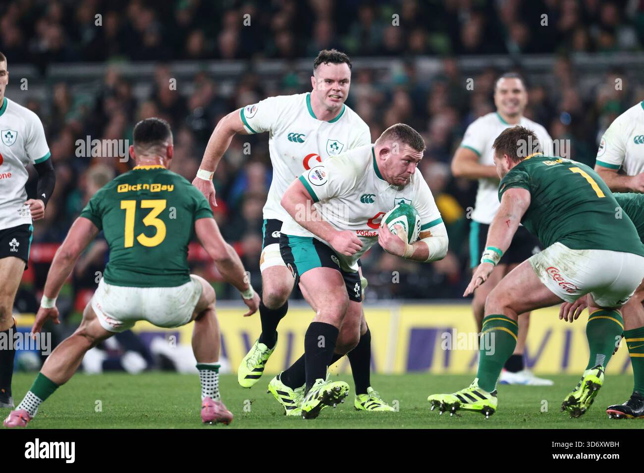 Ireland's Tadhg Furlong, center, runs with the ball towards South ...