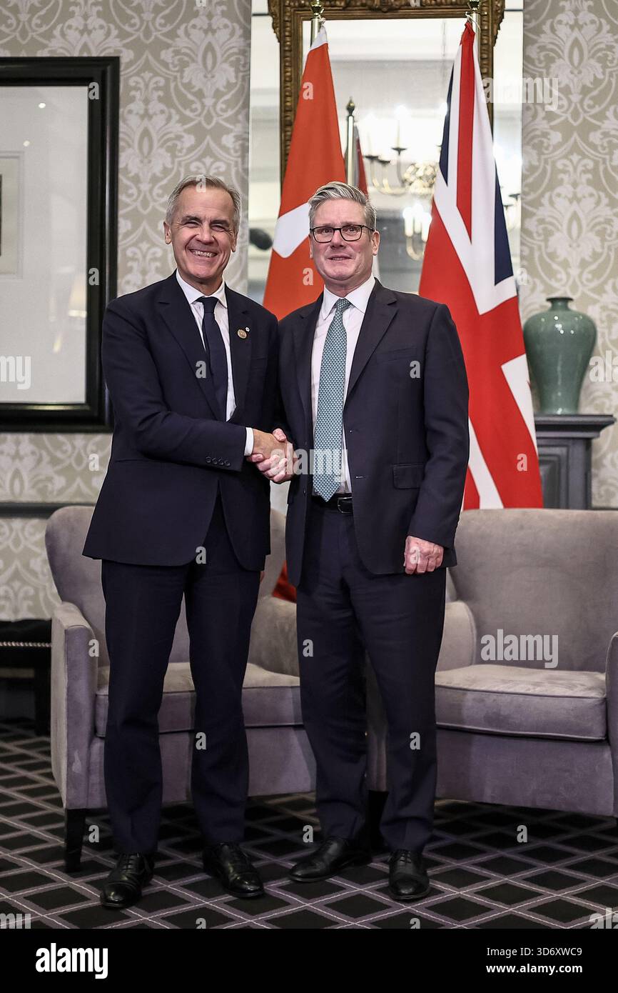 Prime Minister Sir Keir Starmer (right) and Canadian Prime Minister ...