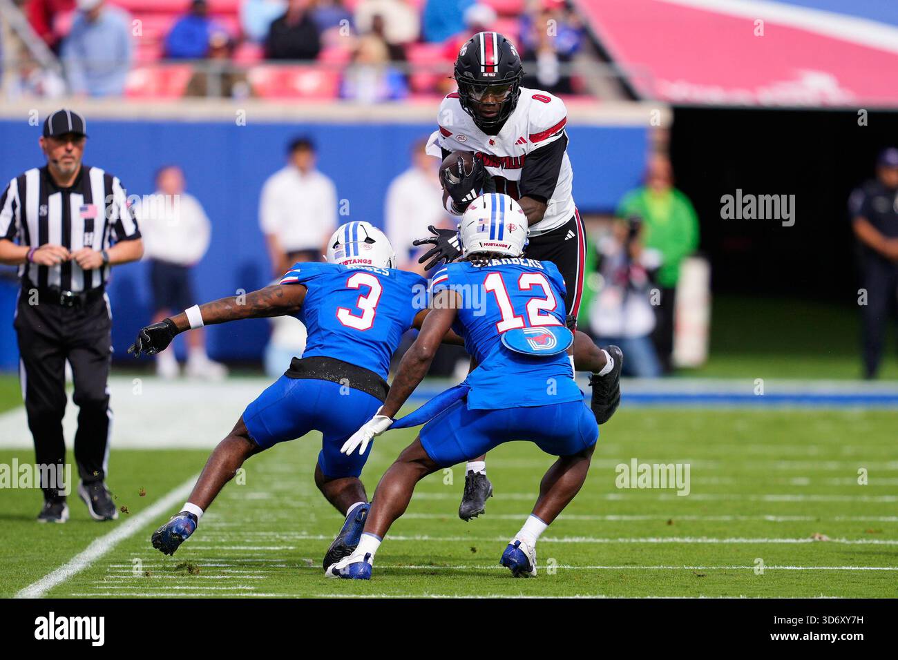 Louisville wide receiver Chris Bell (0) catches a pass and attempts to ...