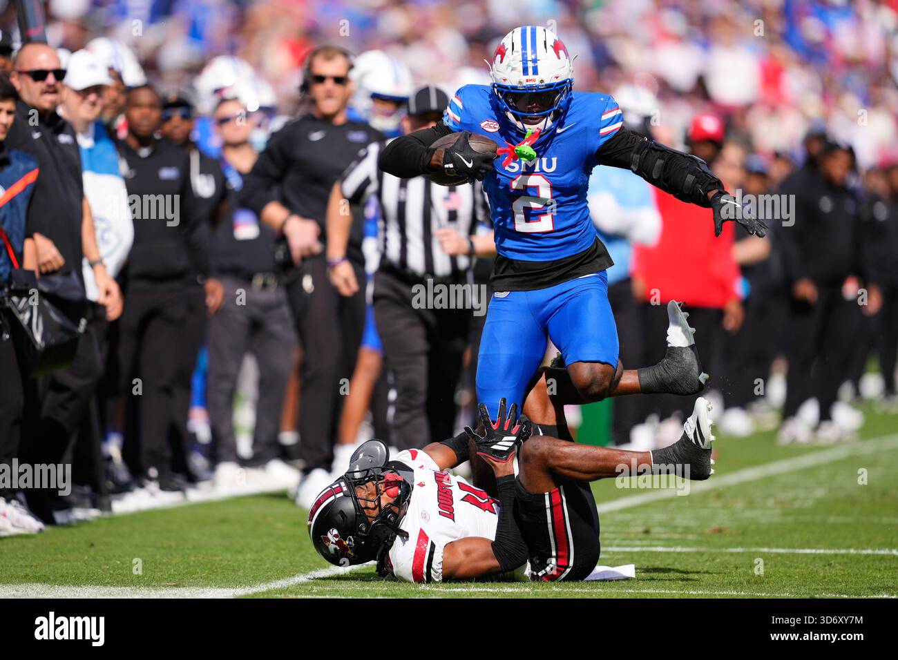 SMU wide receiver Jordan Hudson (2) leaps over Louisville cornerback ...