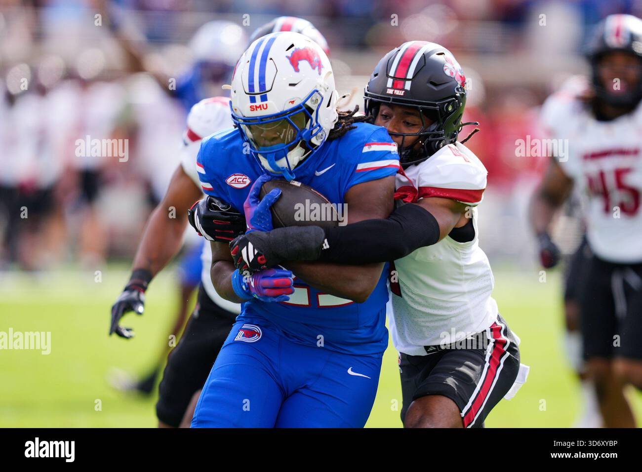 SMU running back T.J. Harden (27) gains yards on a run as Louisville ...