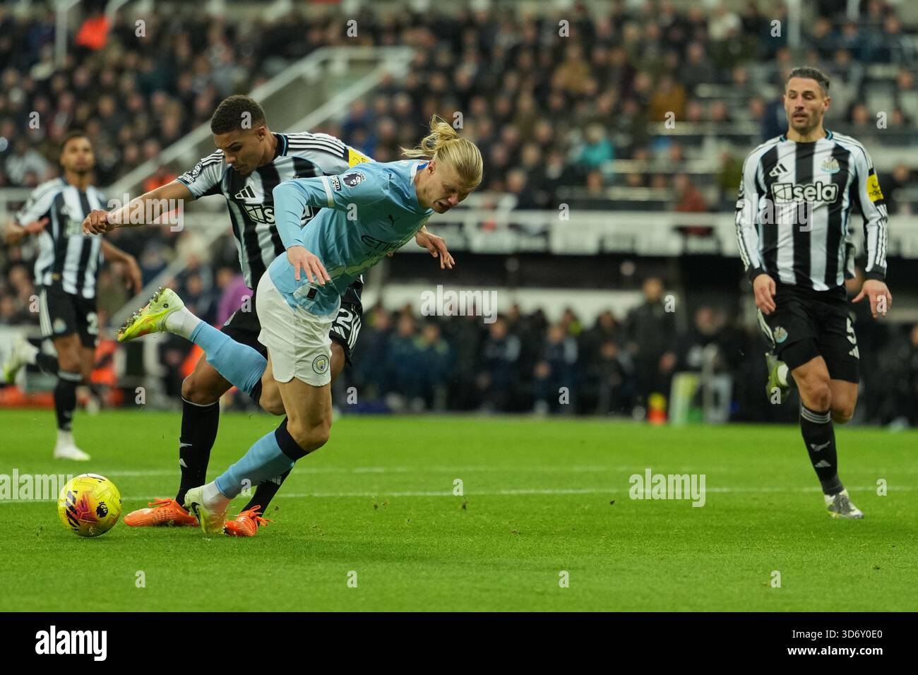 Newcastle's Malick Thiaw, left, and Manchester City's Erling Haaland ...