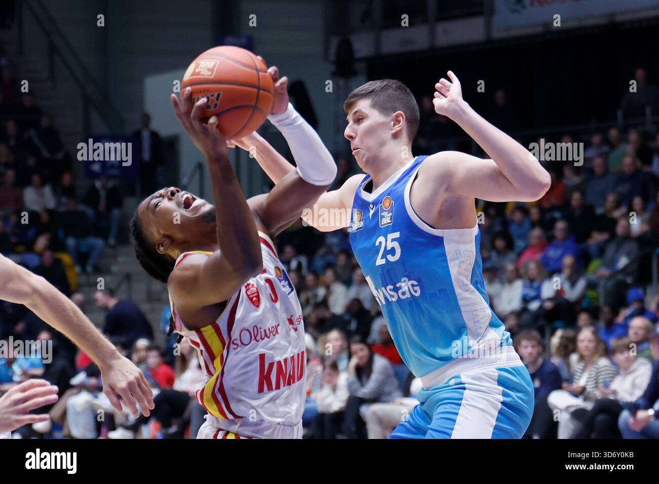 from left Marcus Carr (Fitness First Wuerzburg Baskets, 5) and Jacob ...