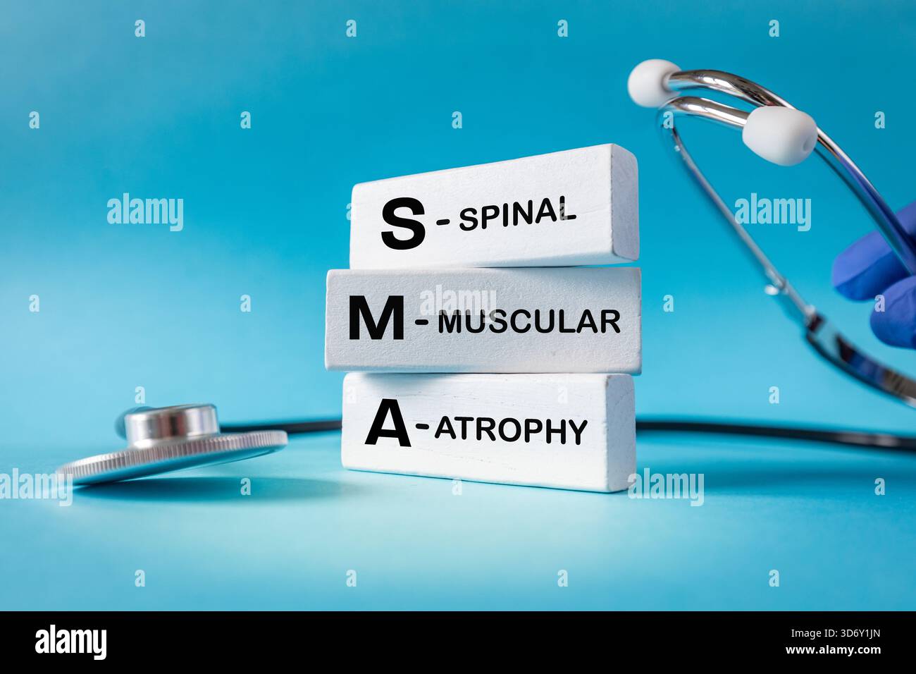 SMA, spinal muscular atrophy. Health concept. Text on white blocks ...