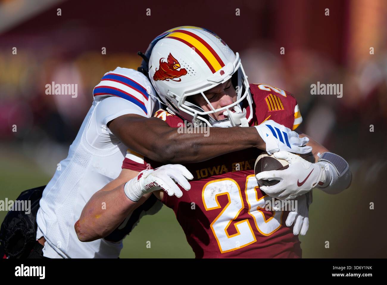 Iowa State running back Carson Hansen (26) runs the ball as he is ...