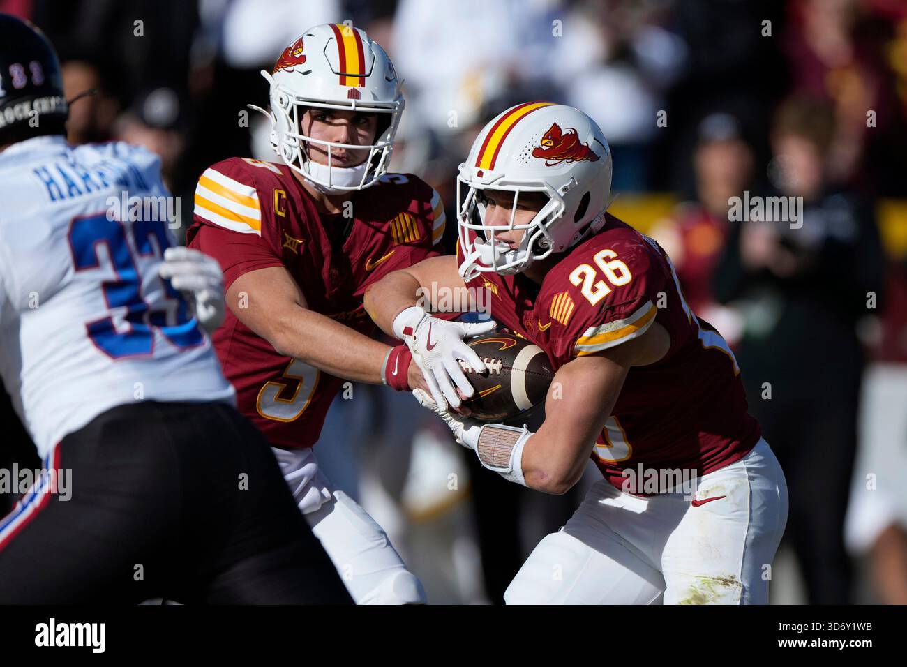 Iowa State quarterback Rocco Becht (3) hands off to running back Carson ...