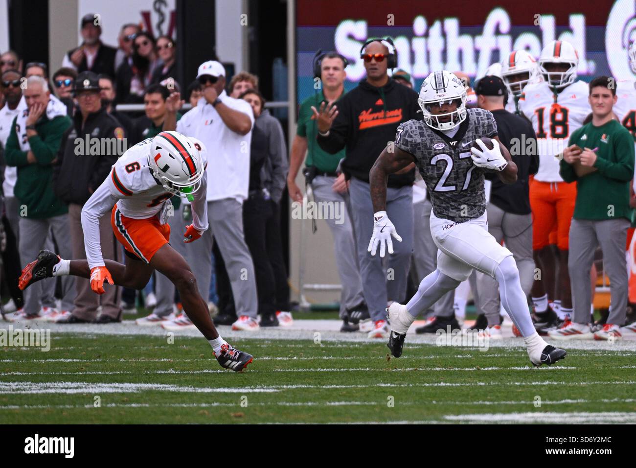 Virginia Tech running back Marcellous Hawkins (27) runs past Miami ...