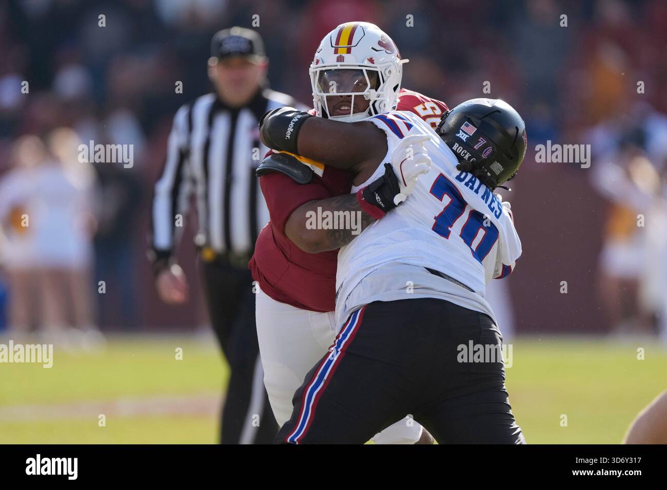 Iowa State defensive lineman Domonique Orange (95) shoves off Kansas ...