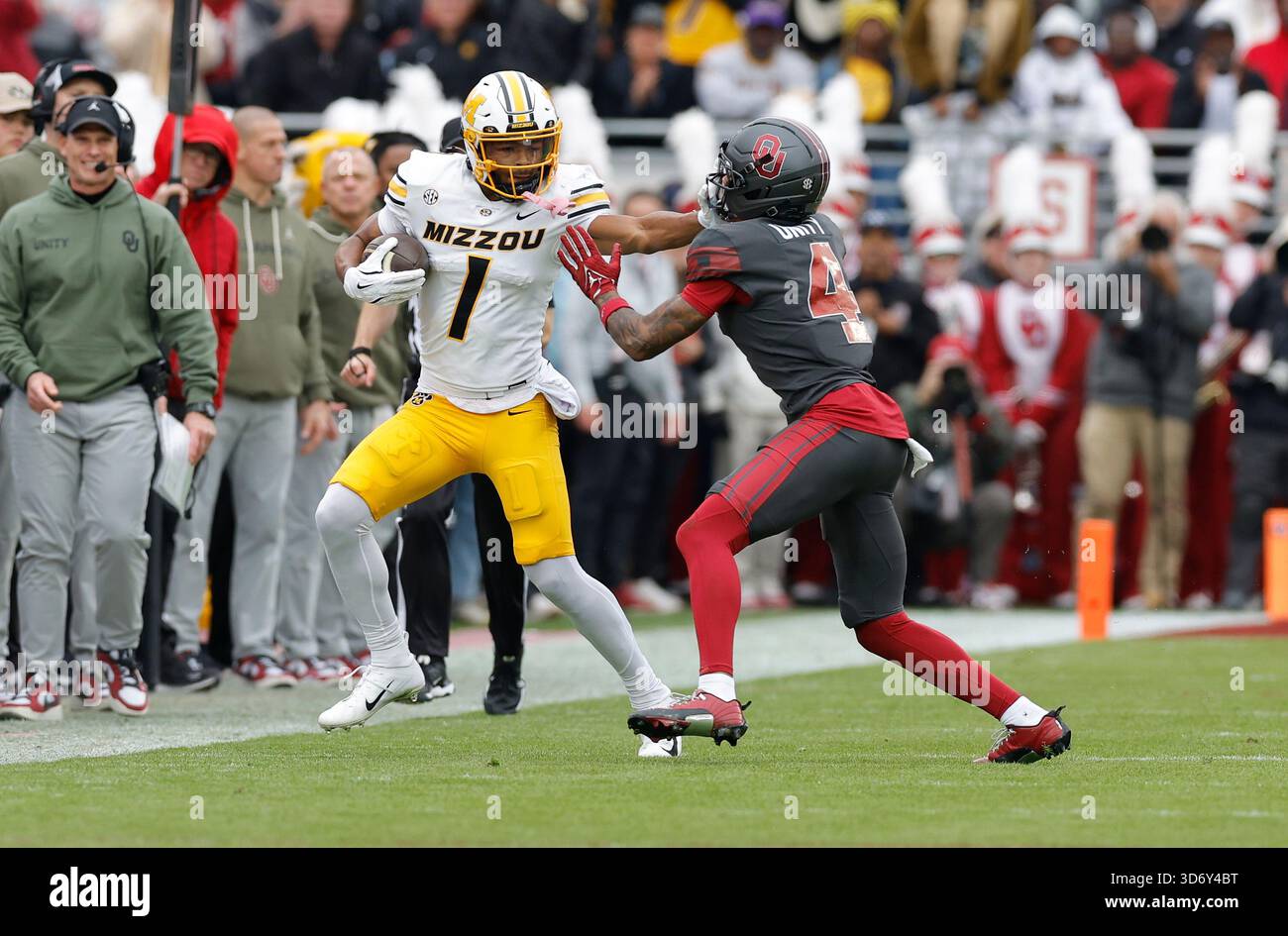 Missouri wide receiver Donovan Olugbode (1) stiff arms Oklahoma ...