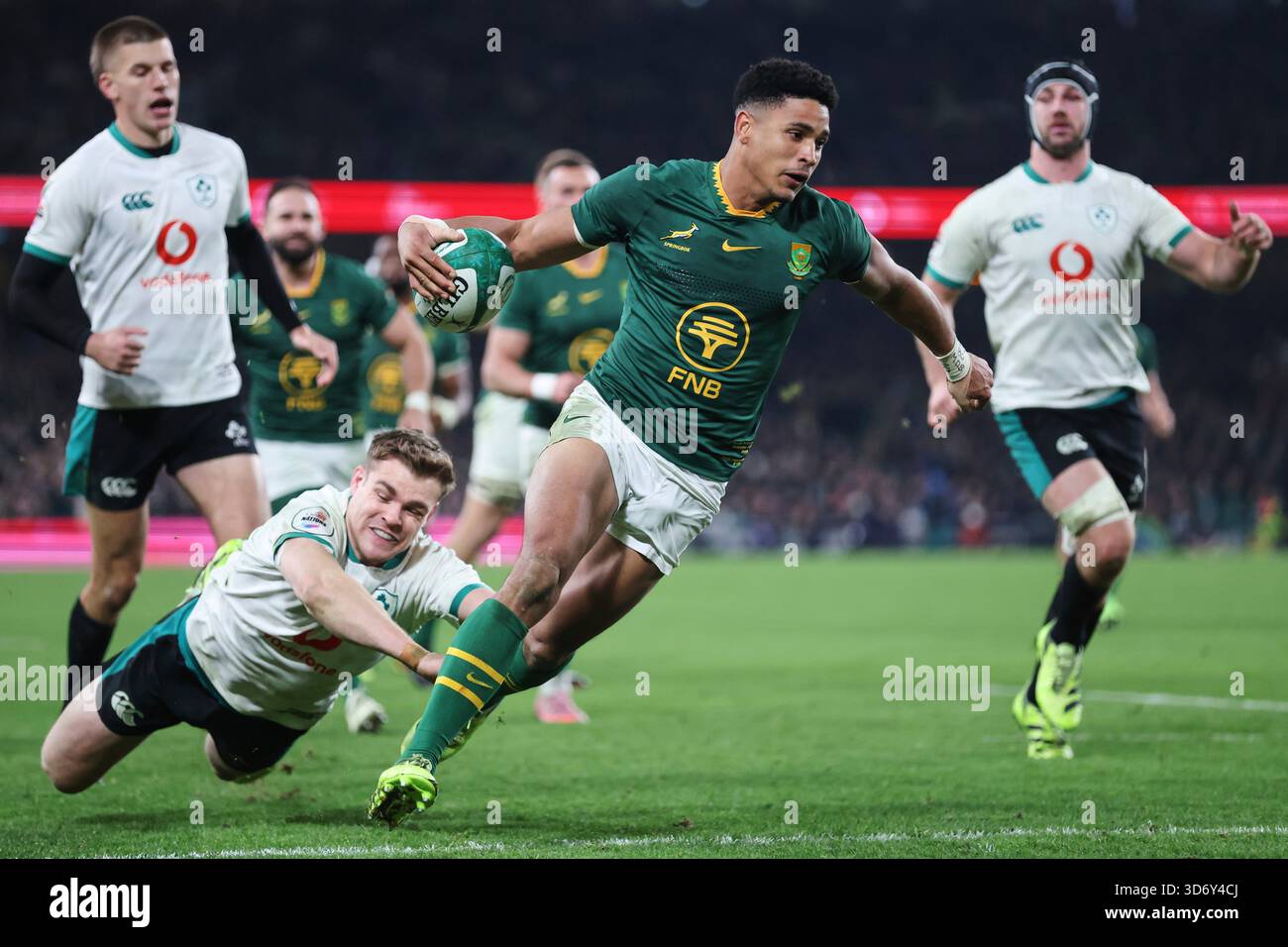 South Africa's Sacha Feinberg-Mngomezulu runs to score a try during the ...