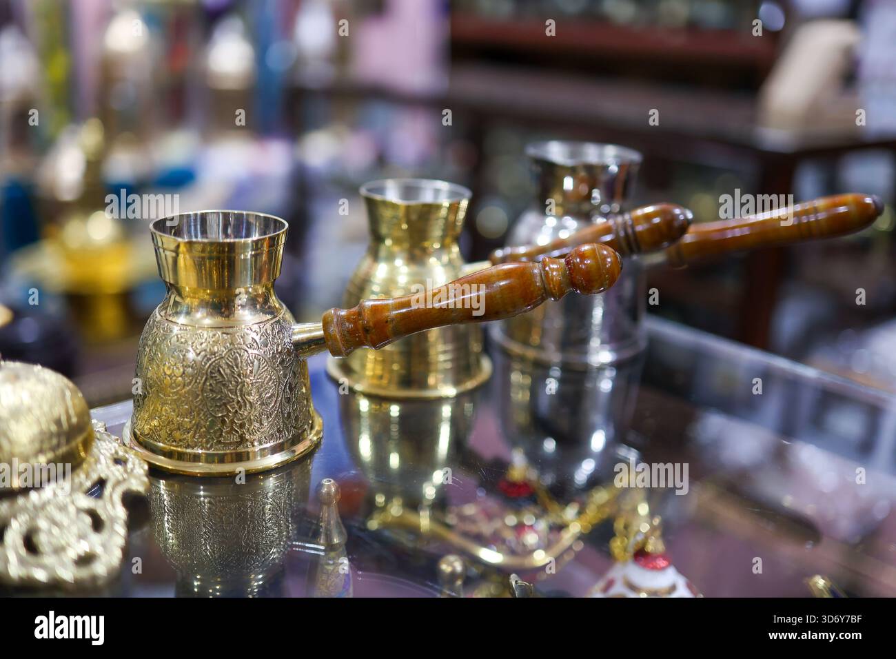 Zanzibar, Tanzania - November 22 2025: Traditional brass cezve coffee ...