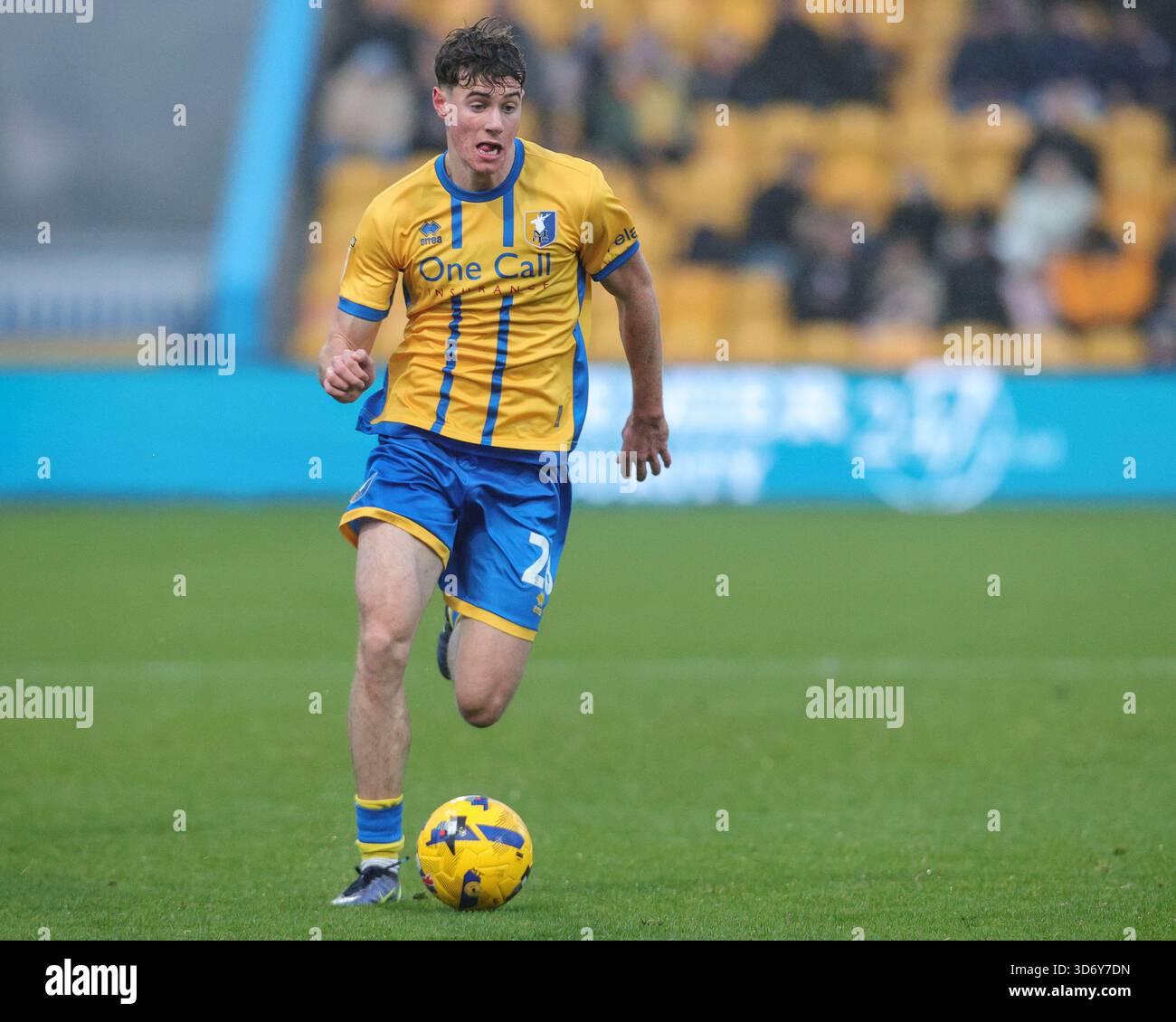 Joe Gardner of Mansfield Town breaks with the ball during the Sky Bet ...