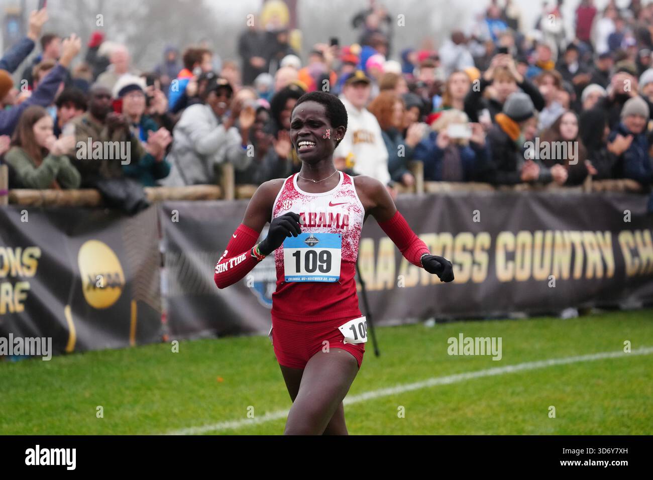 Doris Lemngole of Alabama wins the women's race in 18:25.4 during the ...