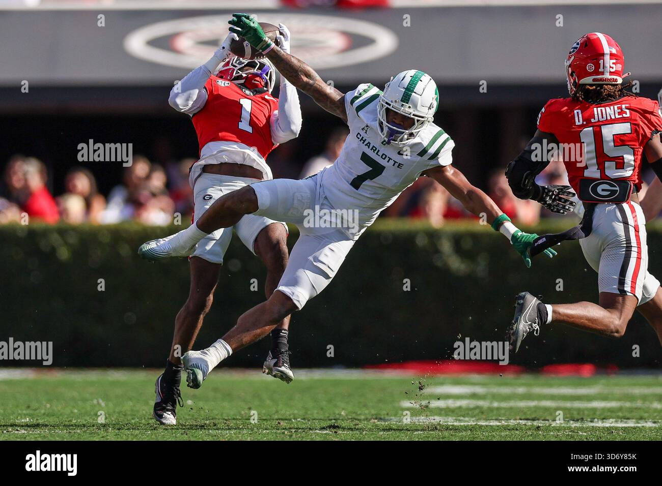 Georgia defensive back Ellis Robinson IV (1) intercepts a pass intended ...