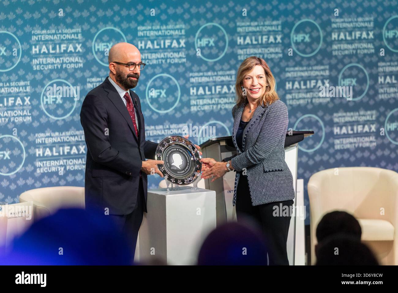 Dr. Evelyn Farkas, right, of the McCain Institute, accepts the 2025 ...