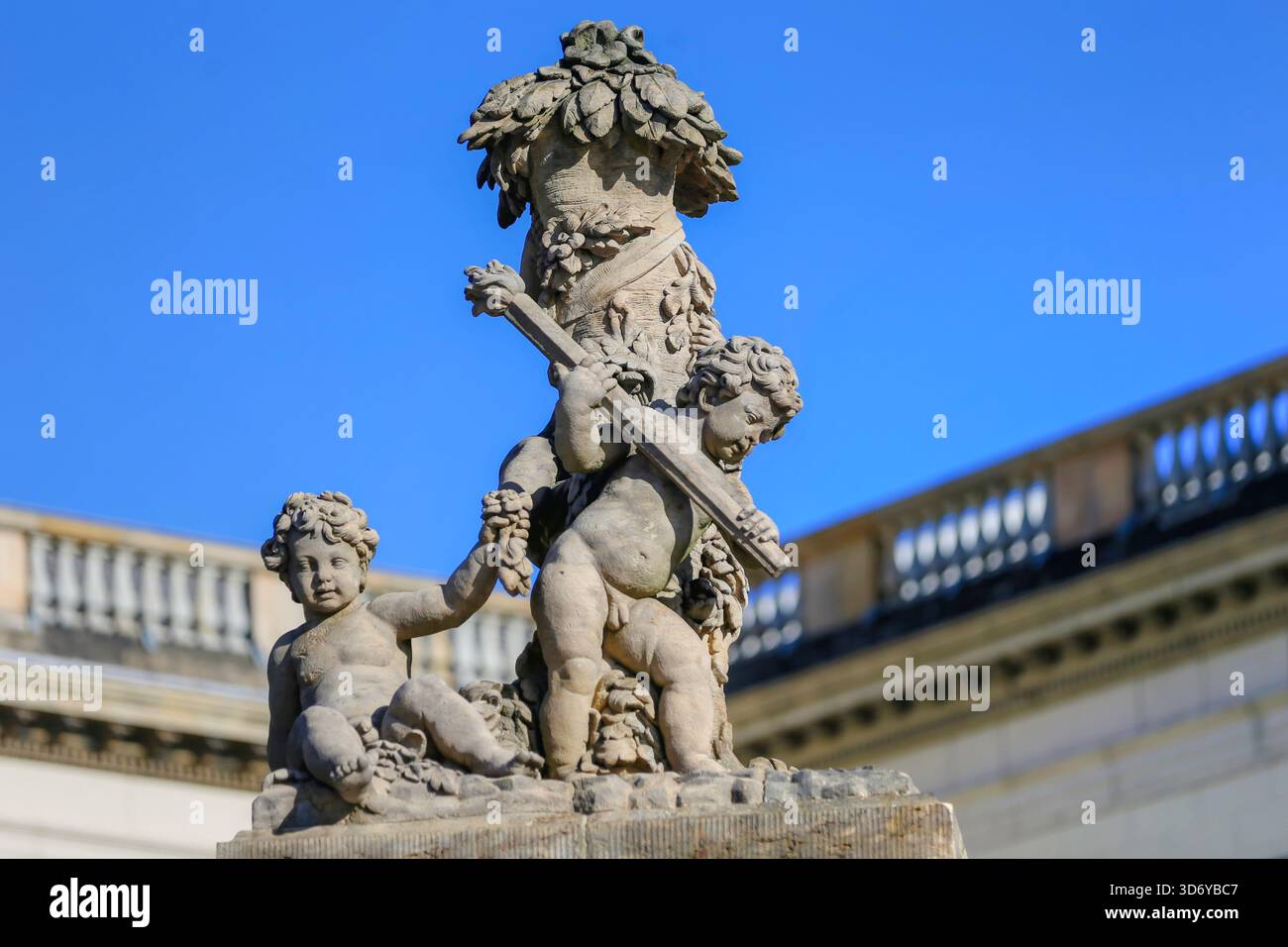 Baroque stone cherub sculptures on a historic building façade in Berlin ...