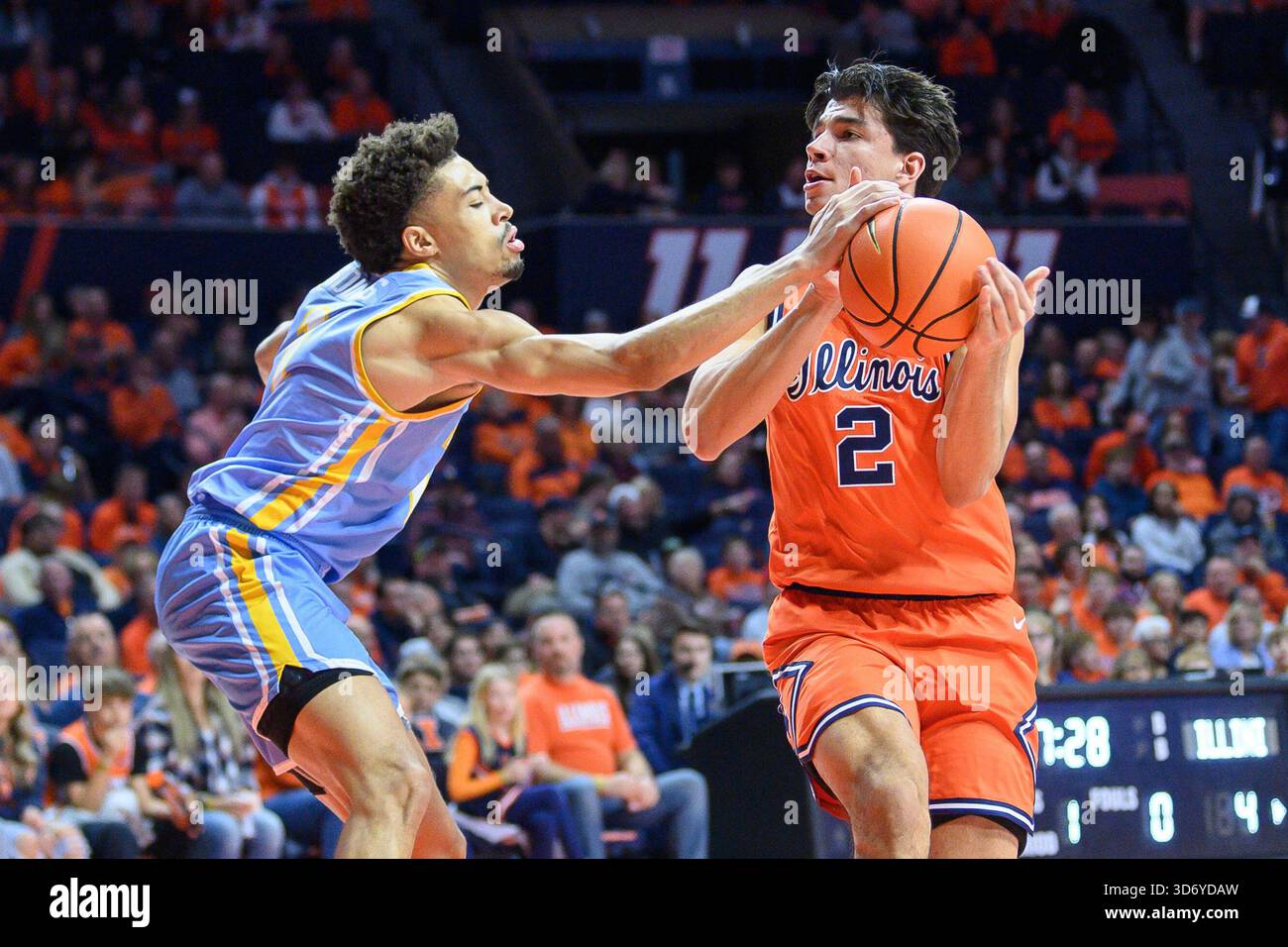 Long Island's Jomo Goings fouls Illinois' Andrej Stojakovic during the ...
