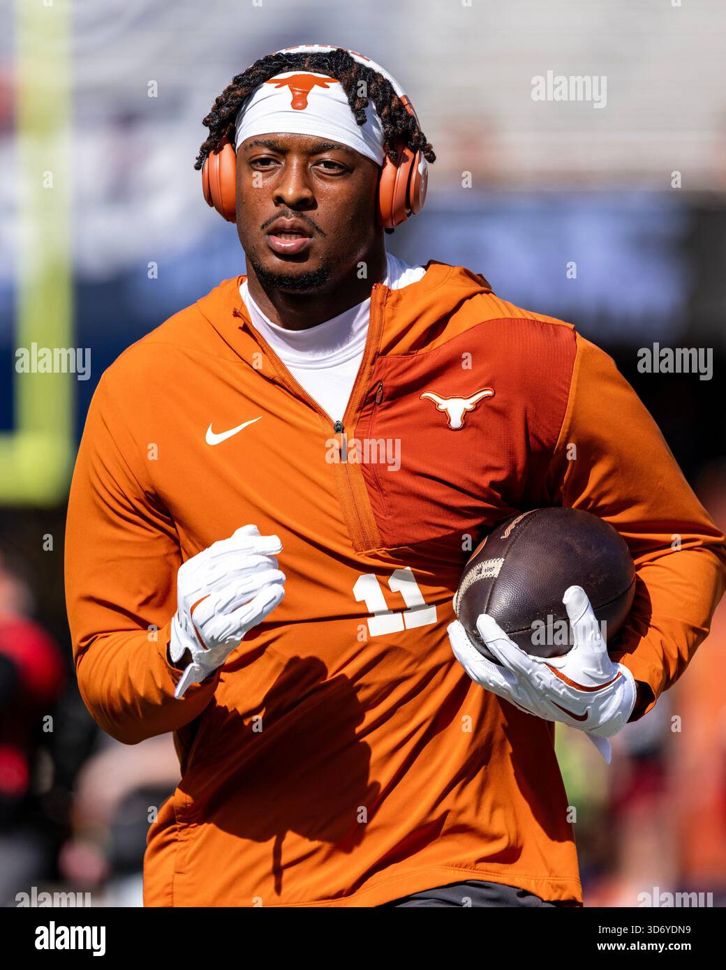 Nov 22, 2025. Michael Terry III (11) of the Texas Longhorns warms up ...