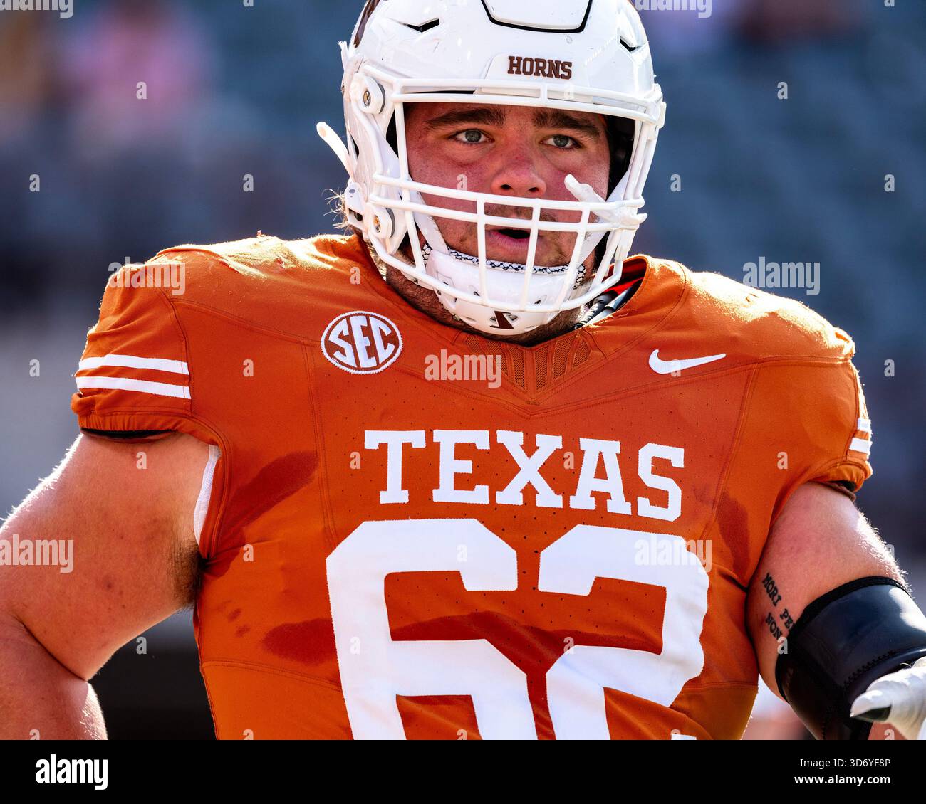 Nov 22, 2025. Connor Robertson (62) of the Texas Longhorns warms up ...