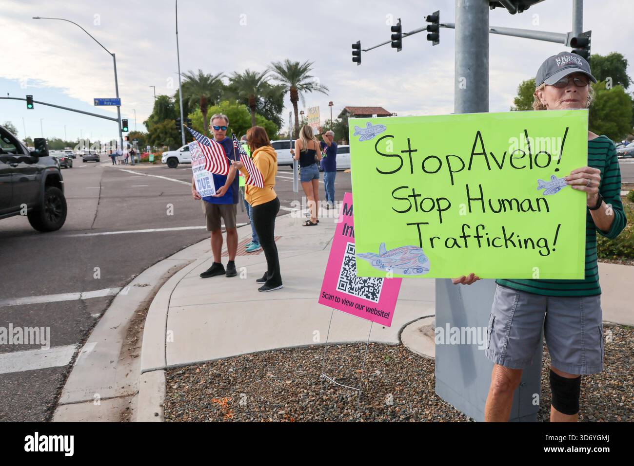 People gathered to protest Avelo Airlines on Power and East Ray Road ...