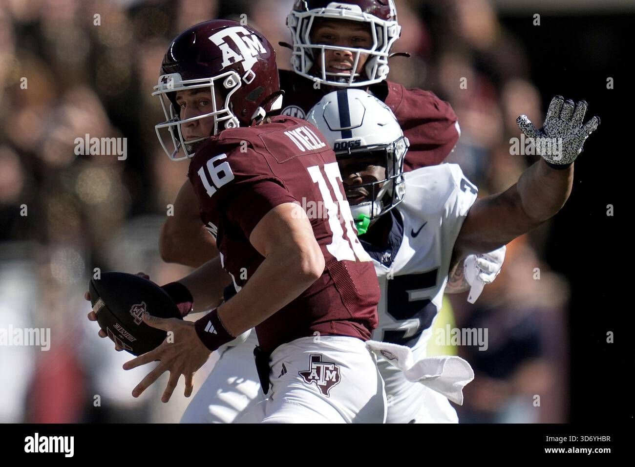 Samford linebacker Deuce Caldwell (35) tackles Texas A&M quarterback ...