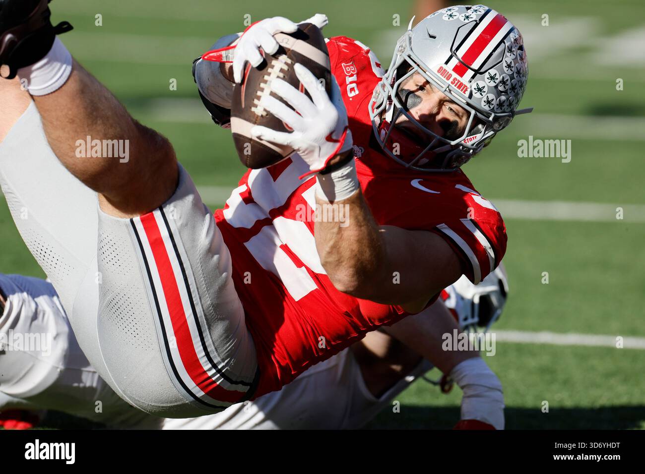 Ohio State defensive lineman Caden Curry recovers a fumble against ...