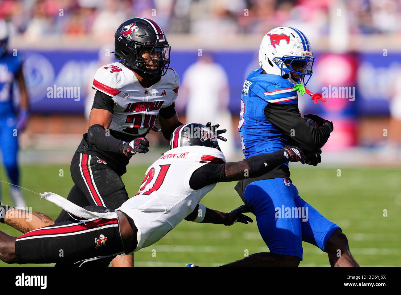 SMU wide receiver Jordan Hudson (2) catches a pass and is tackled by ...