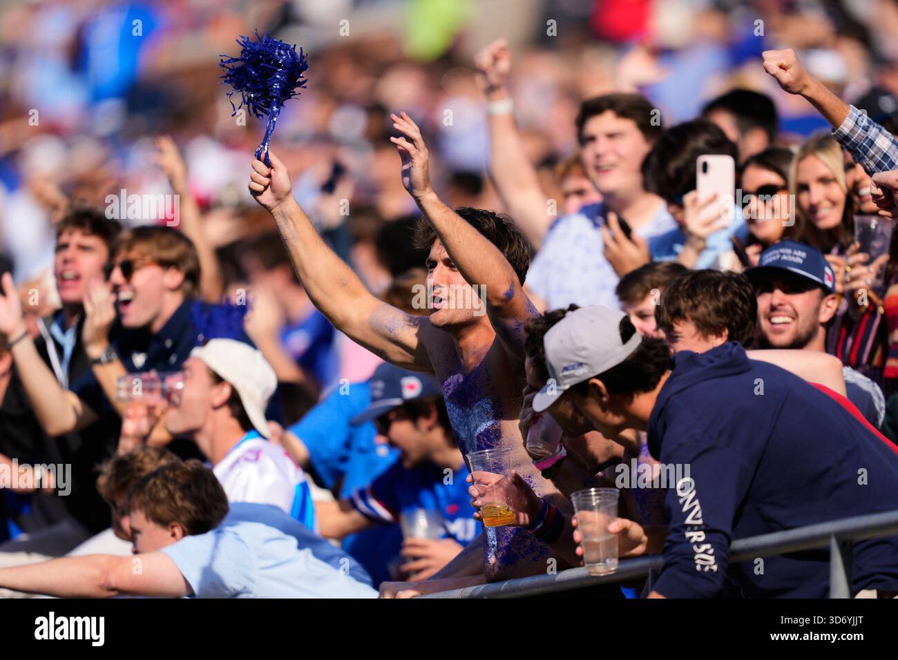 SMU fans cheer their team in the second half of an NCAA college ...