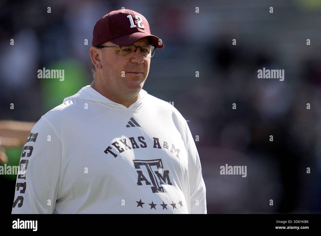 Texas A&M head coach Mike Elko watches his team warmup before the start ...