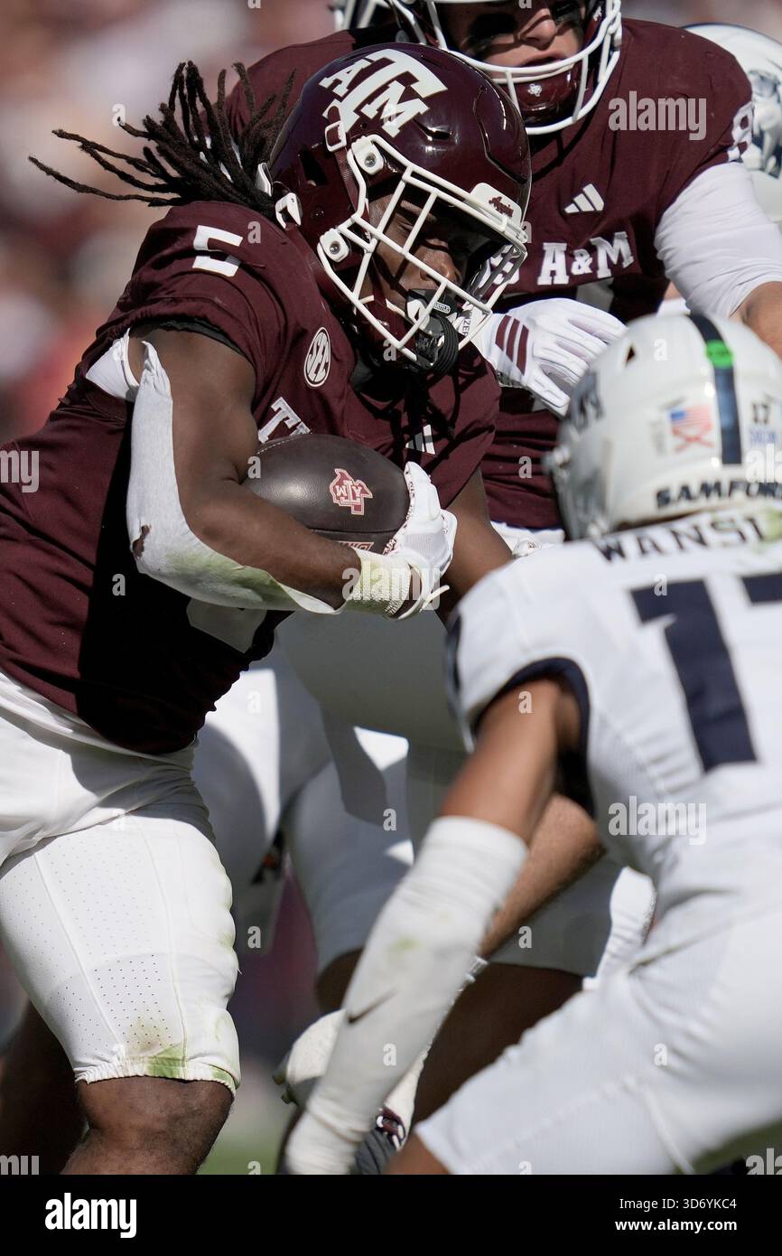 Texas A&M running back Amari Daniels (5) runs the ball against Samford ...