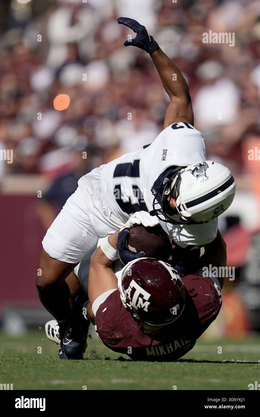 Samford wide receiver Calvin Jones (13) is pulled down after a catch by ...