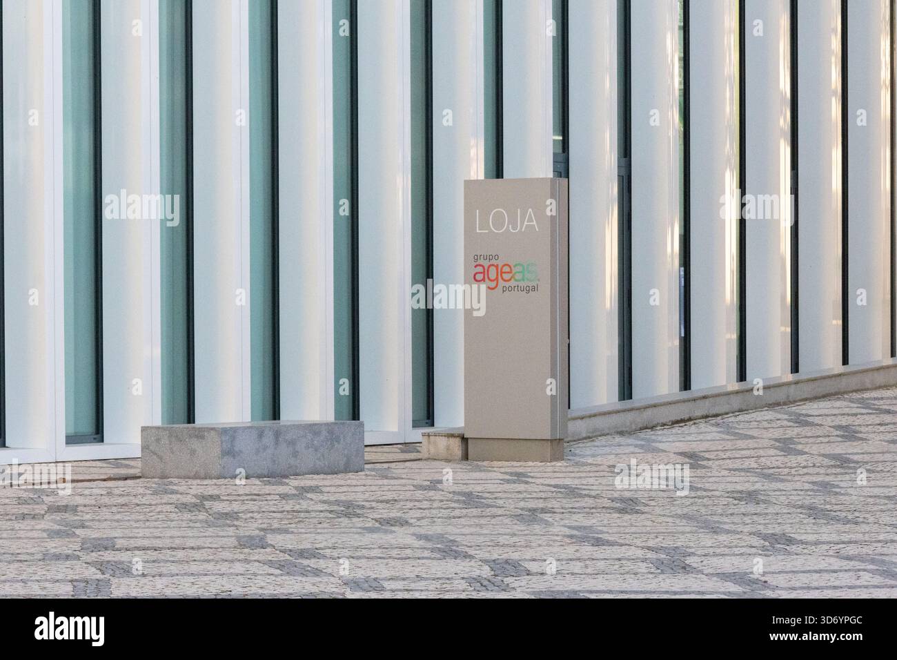 Ageas seguros portugal sign standing outside a modern building with ...