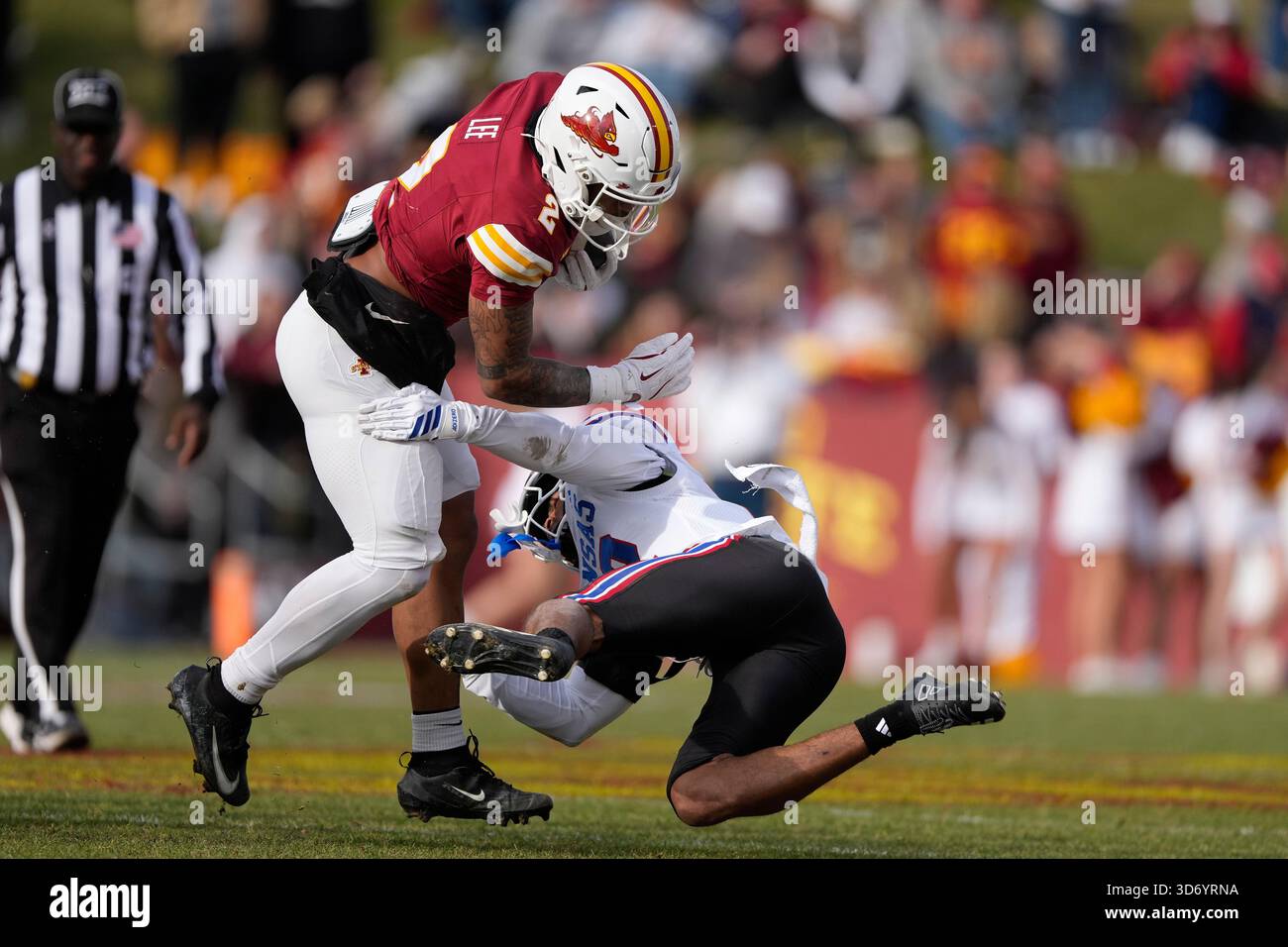 Kansas cornerback Syeed Gibbs (22) wraps up Iowa State running back ...