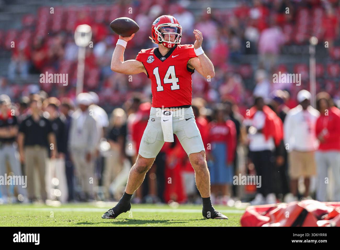 Georgia quarterback Gunner Stockton (14) throws during pregame warmups ...