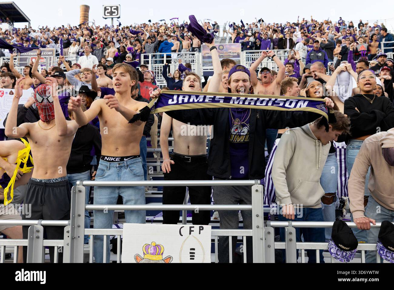James Madison fans cheer during the second half of an NCAA college ...