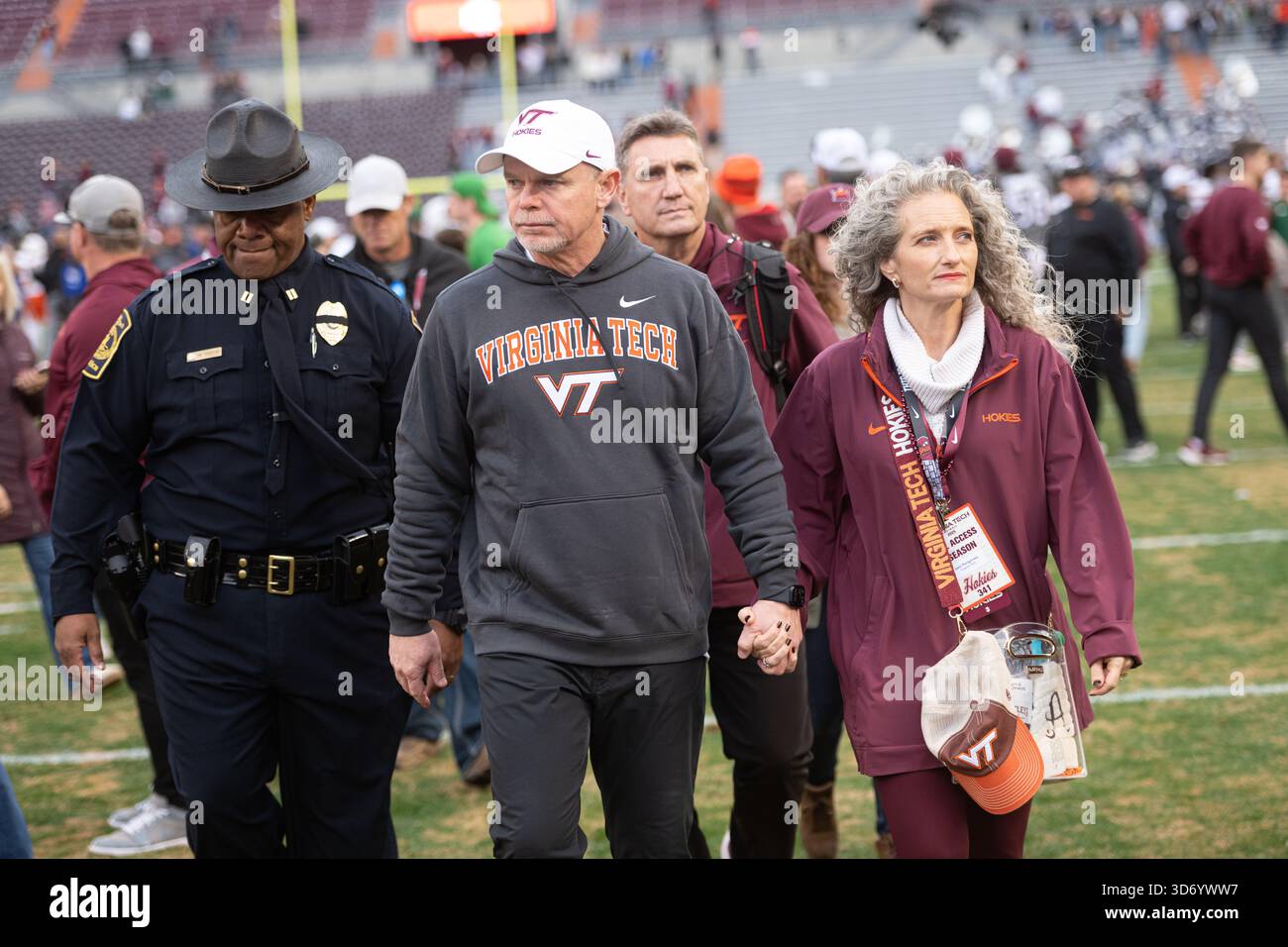 Virginia Tech head coach Philip Montgomery walks off the field ...