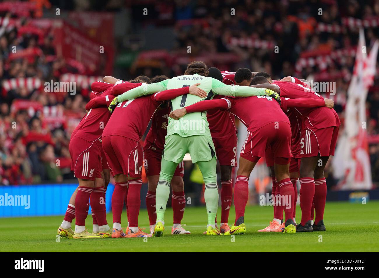 Liverpool's players in a pre kick off huddle during the Premier League ...