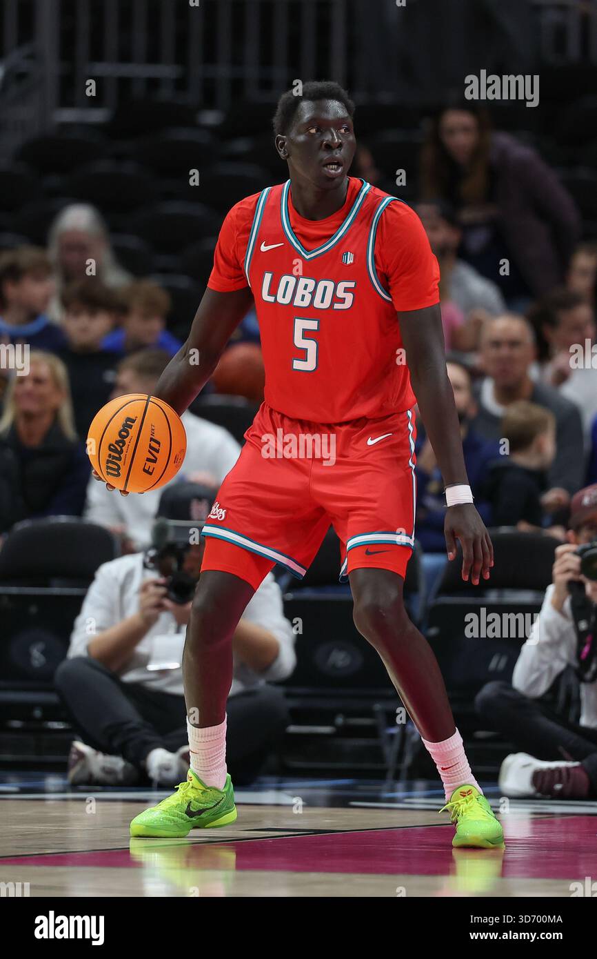 November 21, 2025: New Mexico Lobos forward Antonio Chol (5) dribbles ...