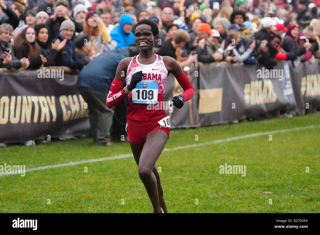 Doris Lemngole of Alabama wins the women's race in 18:25.4 during the ...